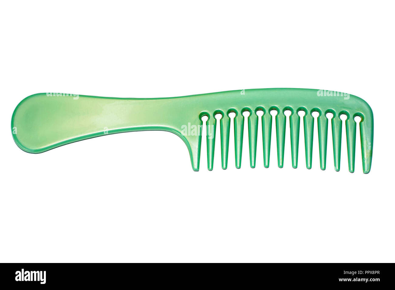 The green hair comb on white background Stock Photo - Alamy