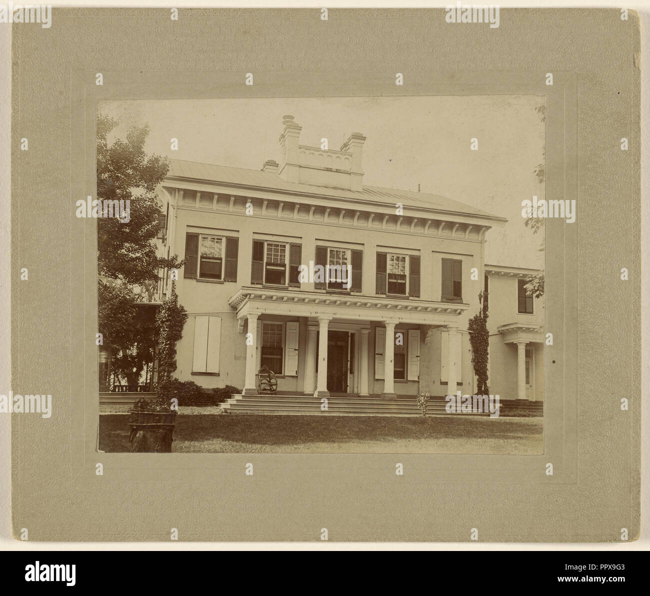 View of a large white house with pillars; about 1890; Gelatin silver ...