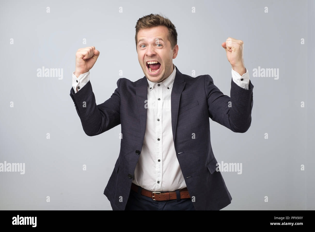 Happy portrait excited man hi-res stock photography and images - Alamy