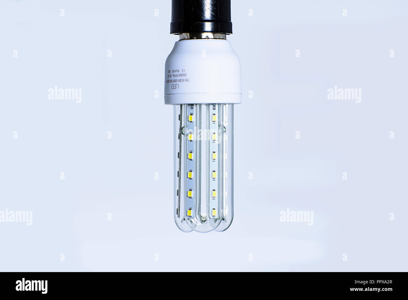 Energy saving LED light bulb on a white background Stock Photo - Alamy