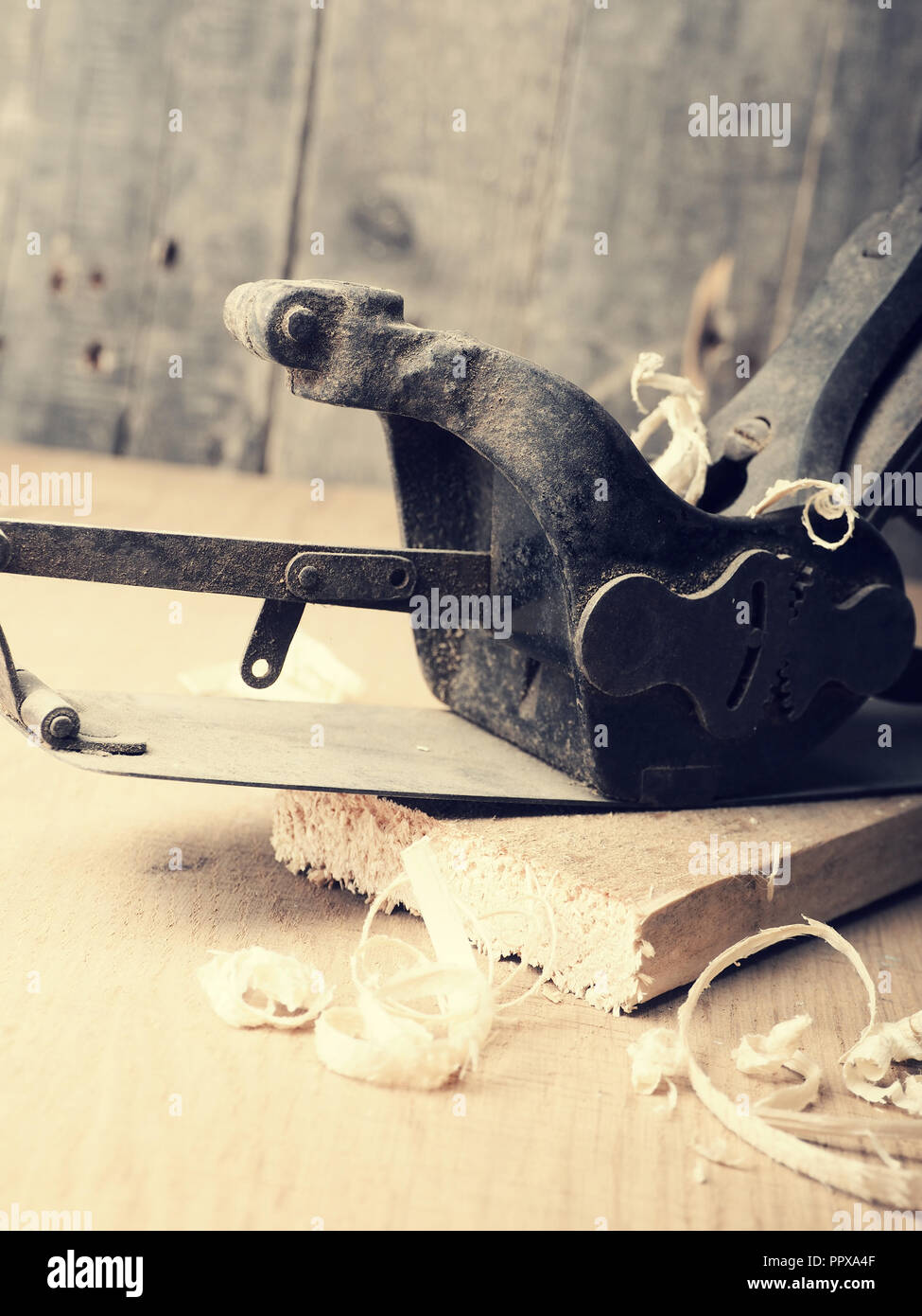 Old used wood plane on a work bench using as traditional wood working ...