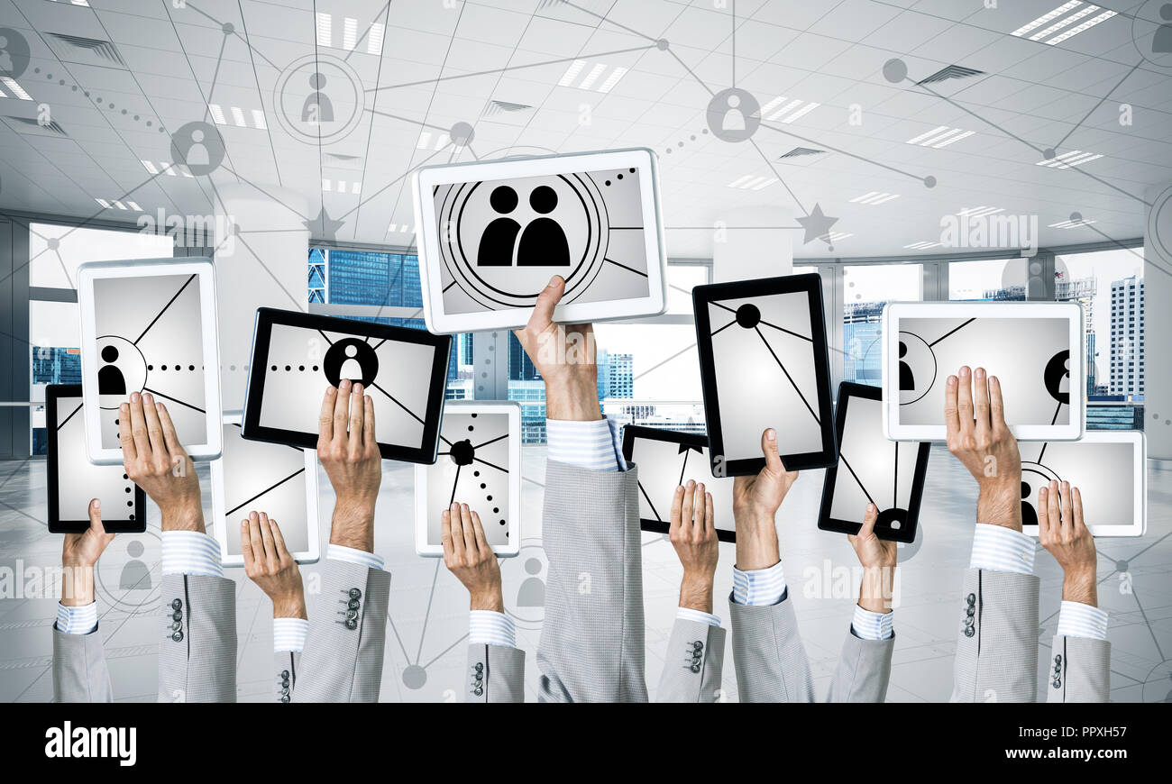 Close of businessman hands in line showing tablet pc presenting Stock ...