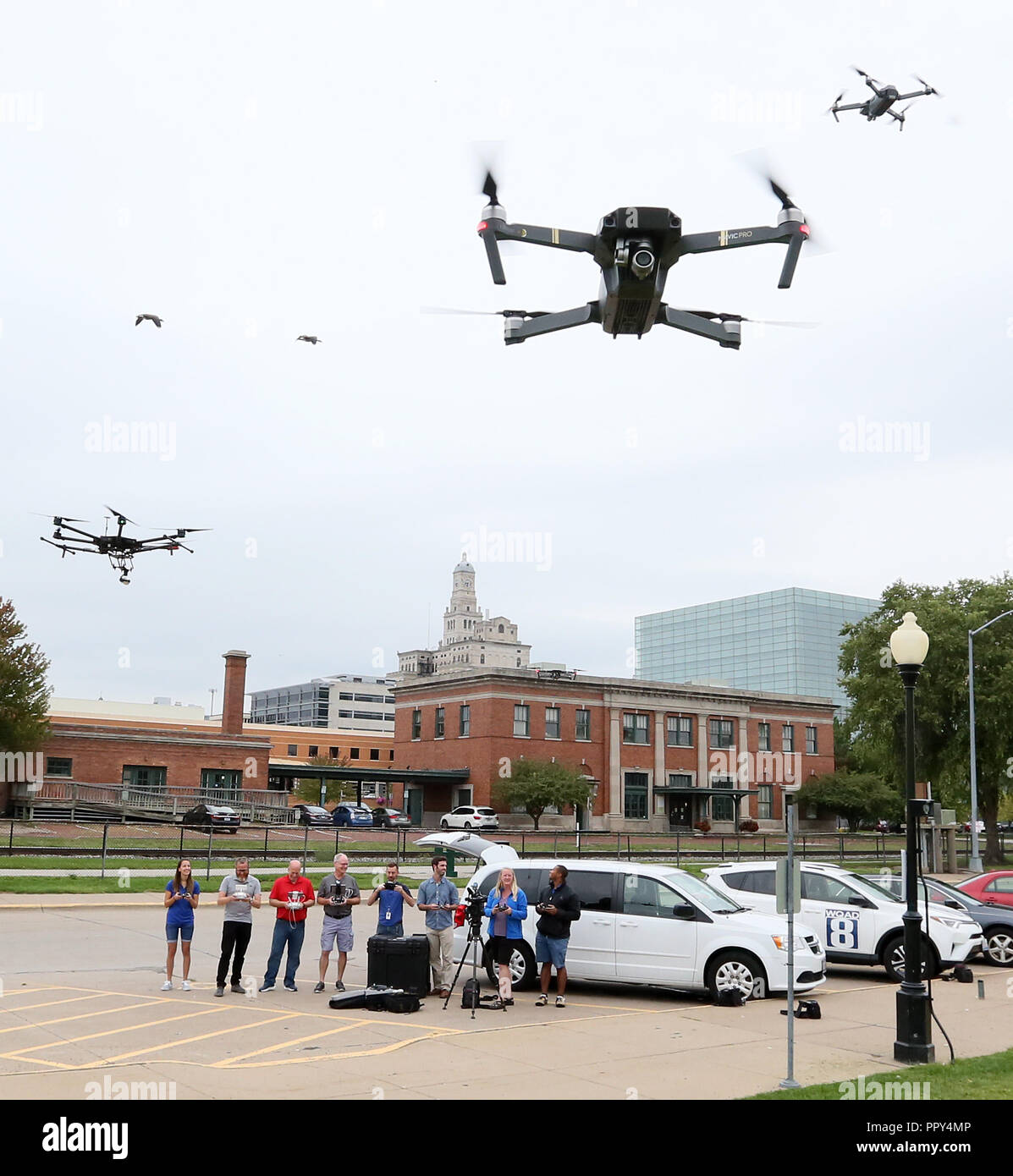 Flying drones in park hi-res stock photography and images - Alamy