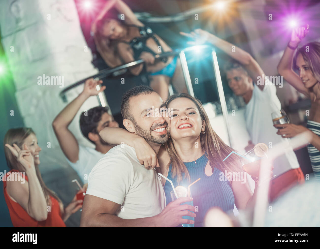 Couple Hugging In Nightclub High Resolution Stock Photography and ...
