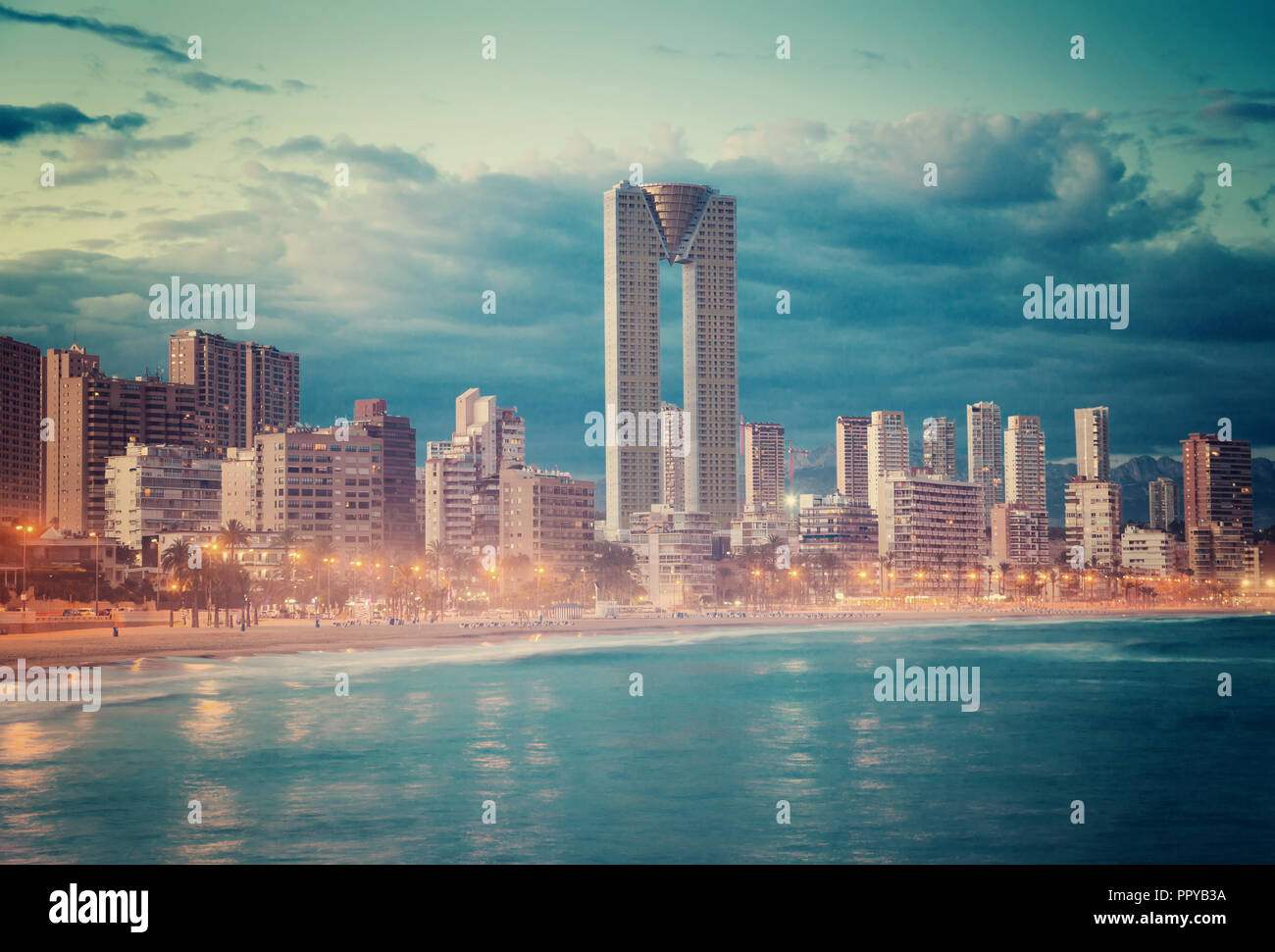 night panoramic view on lights of Benidorm city with seafront and ...