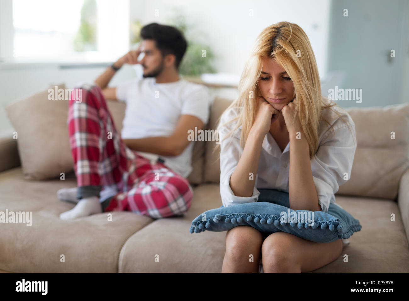 Stressed couple arguing and having marriage problems Stock Photo - Alamy