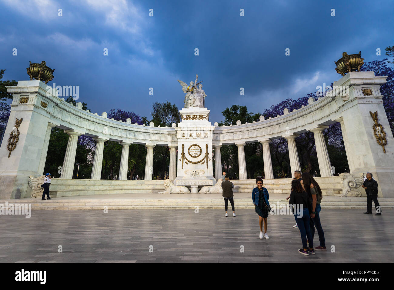 People visiting Benito Juárez Hemicycle in Alameda Central Park, Mexico ...