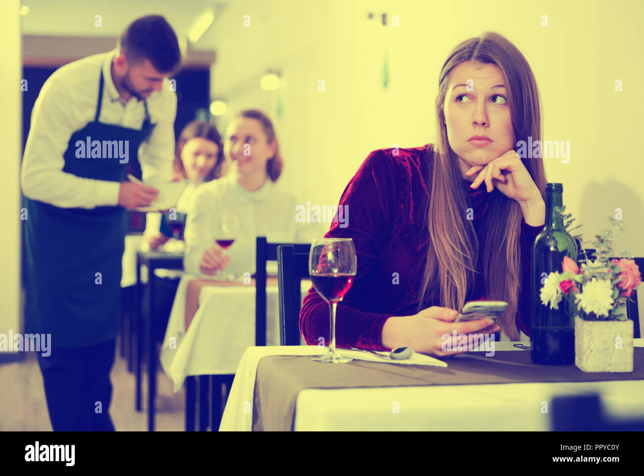 Woman eating alone in luxury restaurant hi-res stock photography and ...
