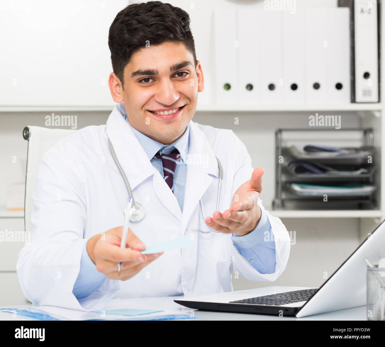 Man therapist is giving the conclusion about health of client in clinic ...