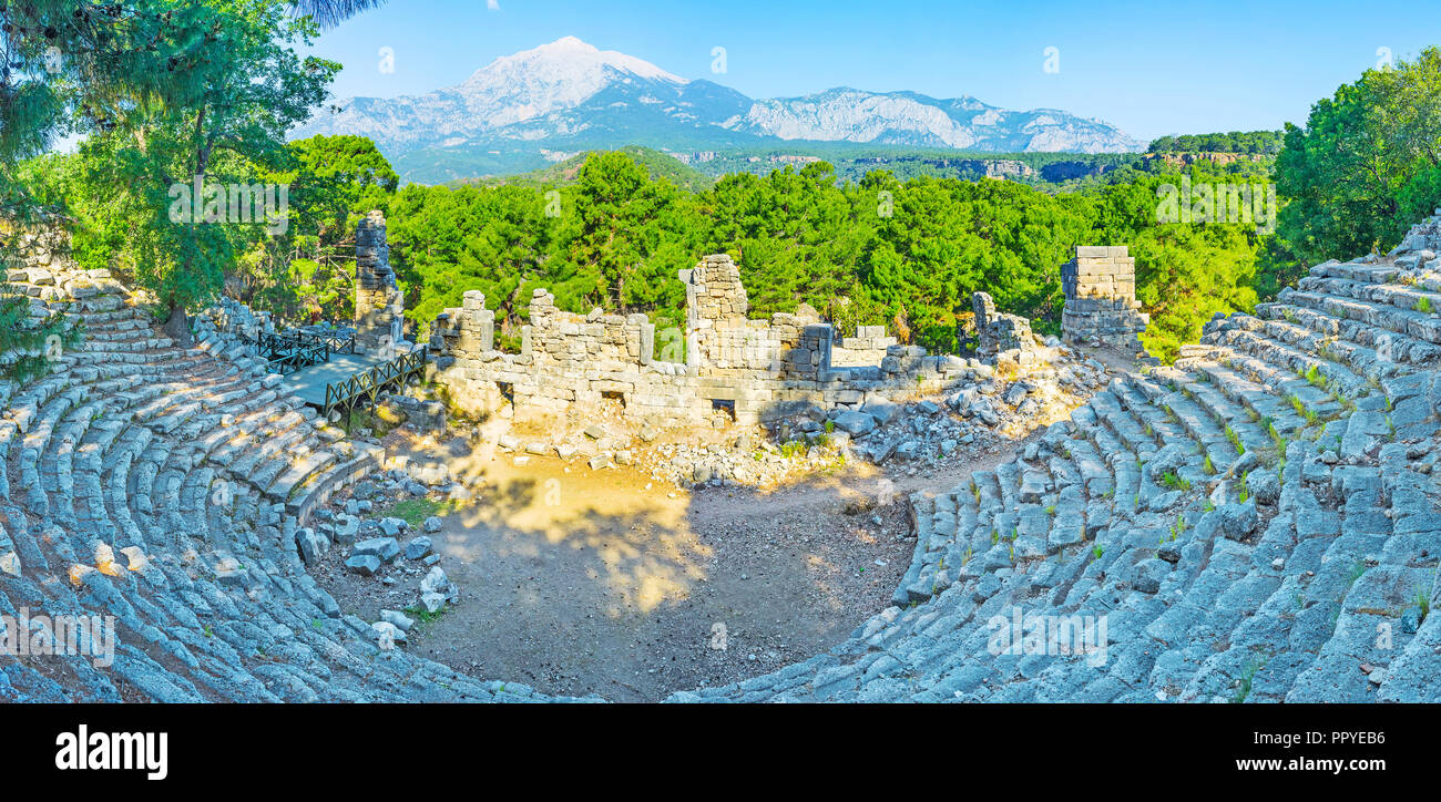 Panorama of ancient Roman amphitheatre in Phaselis with lush pines and ...