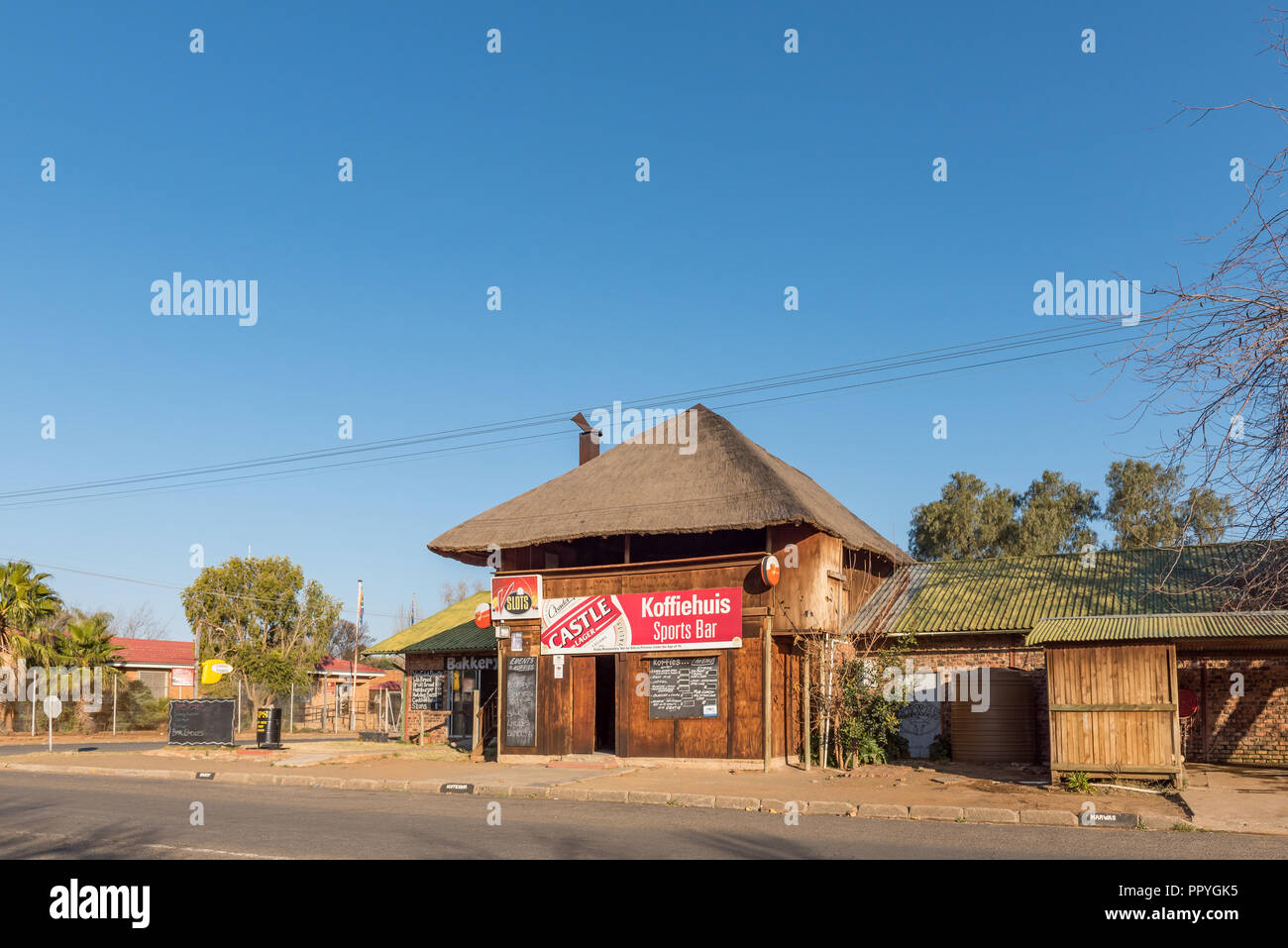 BRANDFORT, SOUTH AFRICA, AUGUST 2, 2018: A street scene, with coffee ...