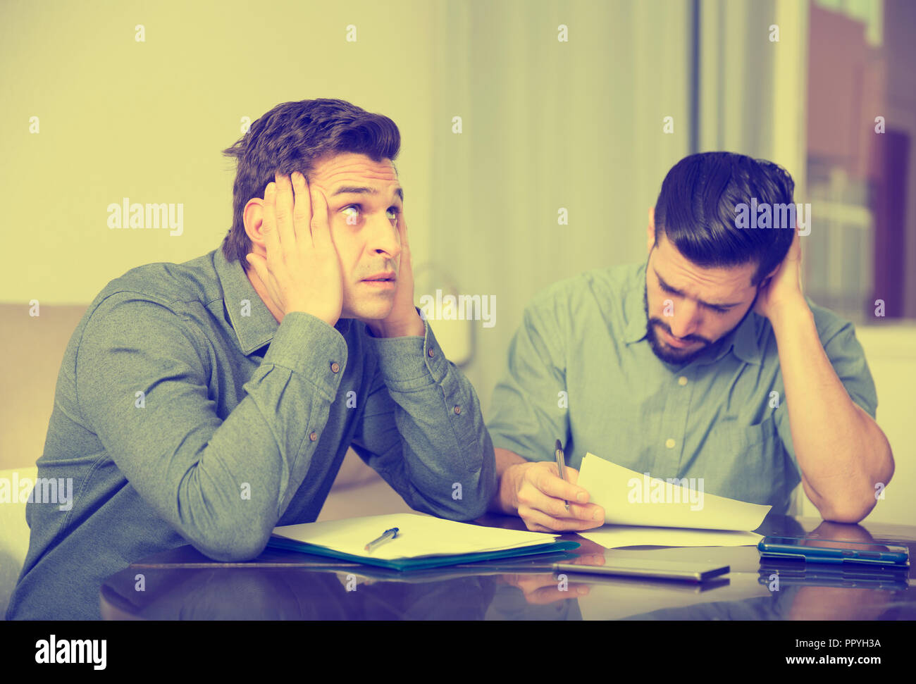 Two upset male friends hi-res stock photography and images - Alamy