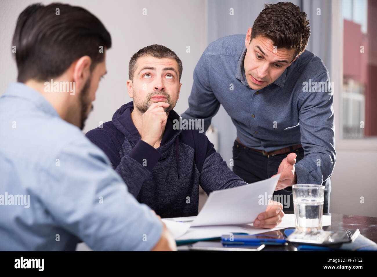 Adult group friends uncertainty hi-res stock photography and images - Alamy