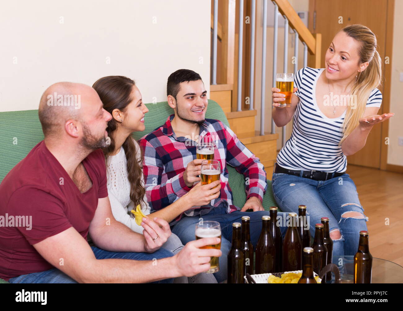 Friends having fun at house party Stock Photo - Alamy