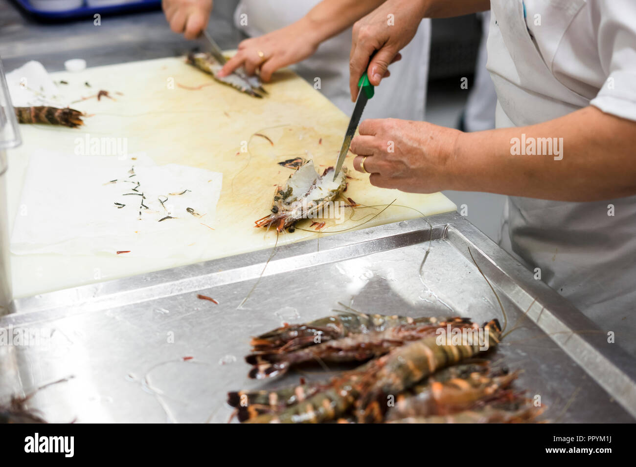 Tiger prawn cleaning hi-res stock photography and images - Alamy