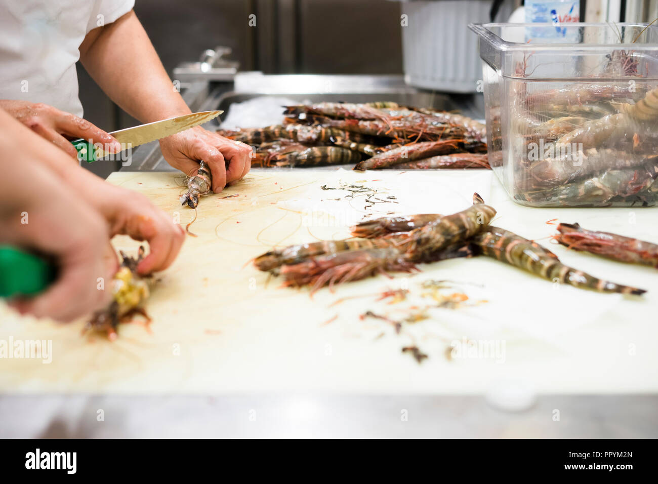 Tiger prawn cleaning hi-res stock photography and images - Alamy