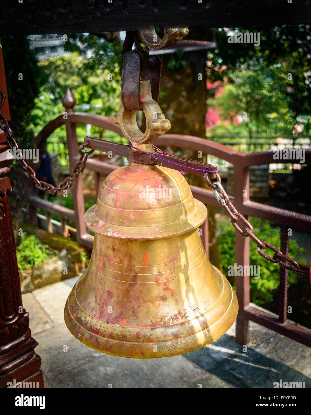 In Hinduism, bells are generally hung at the temple dome in front of ...
