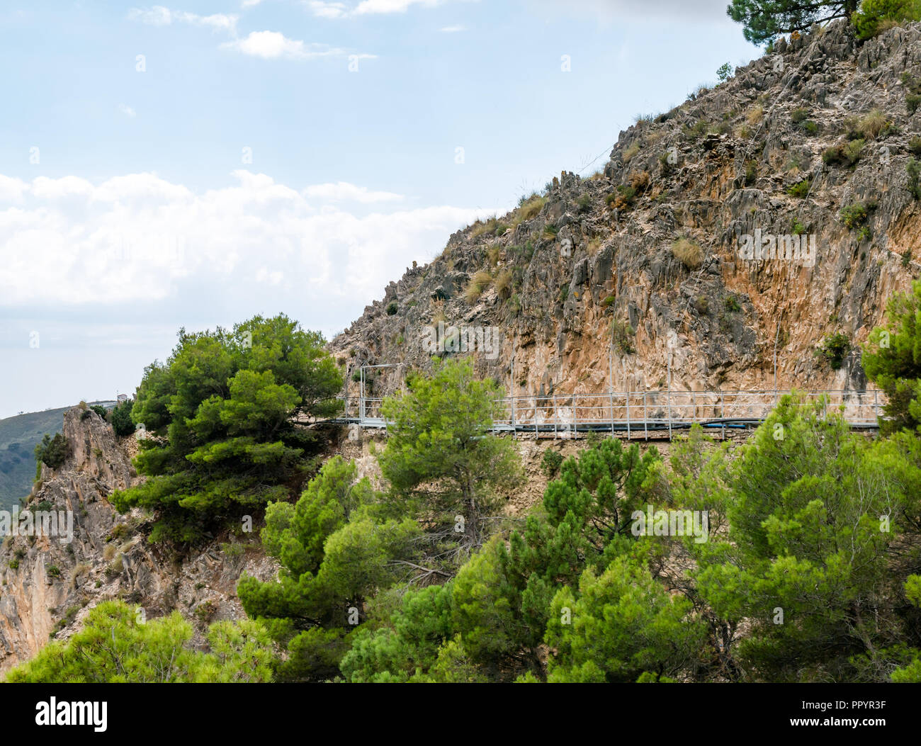 View of mounbtain gorge cliff walkway, Sierras de Tejeda Natural park ...
