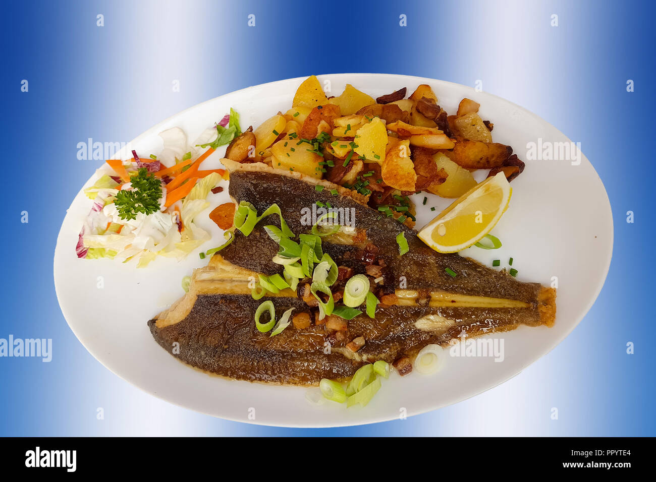 Fish dish-fried fish Plaice fillet and vegetables with fried potatoes ...