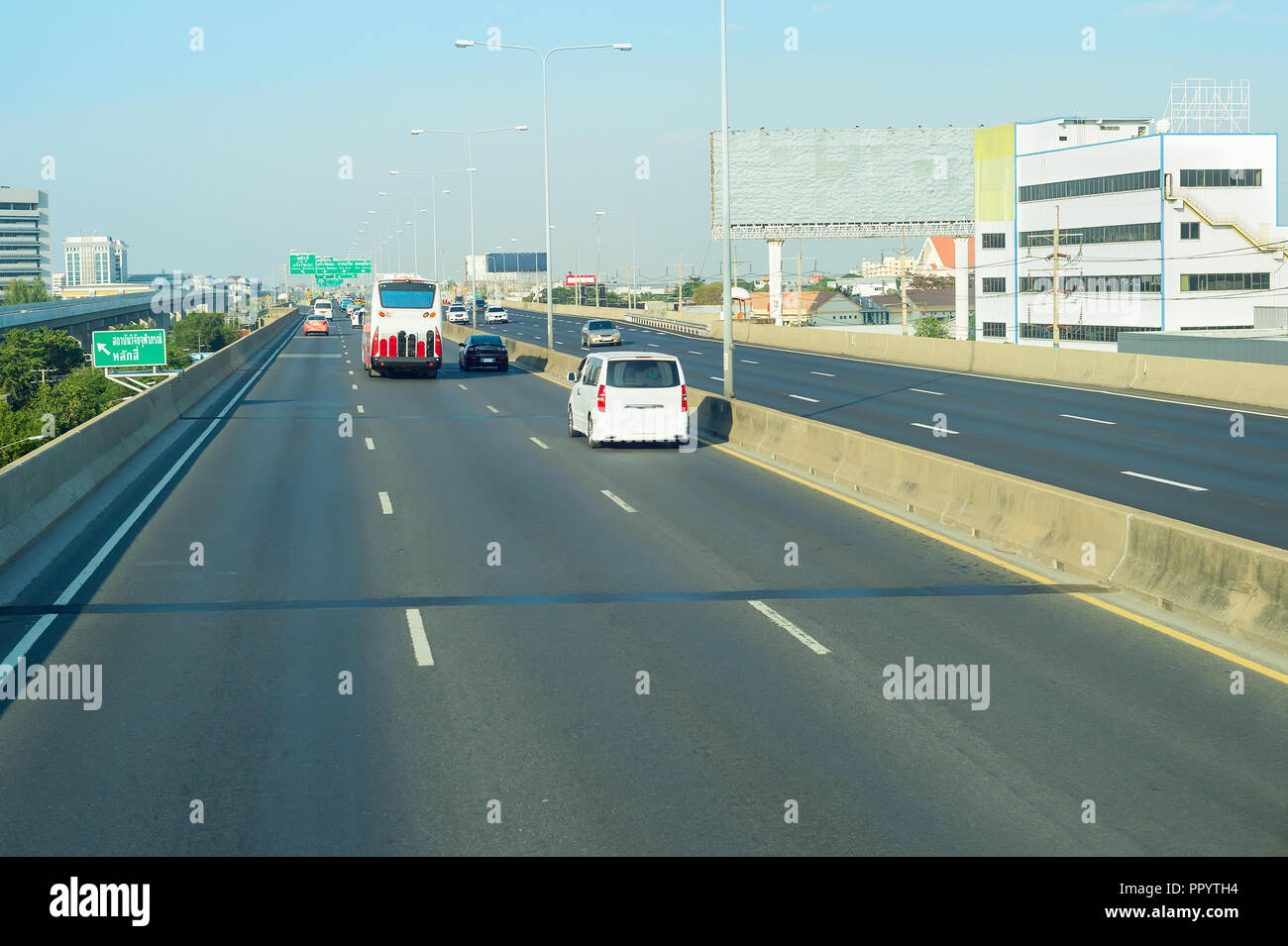 Cars and buses riding in traffic on highway, Bangkok, Thailand Stock ...
