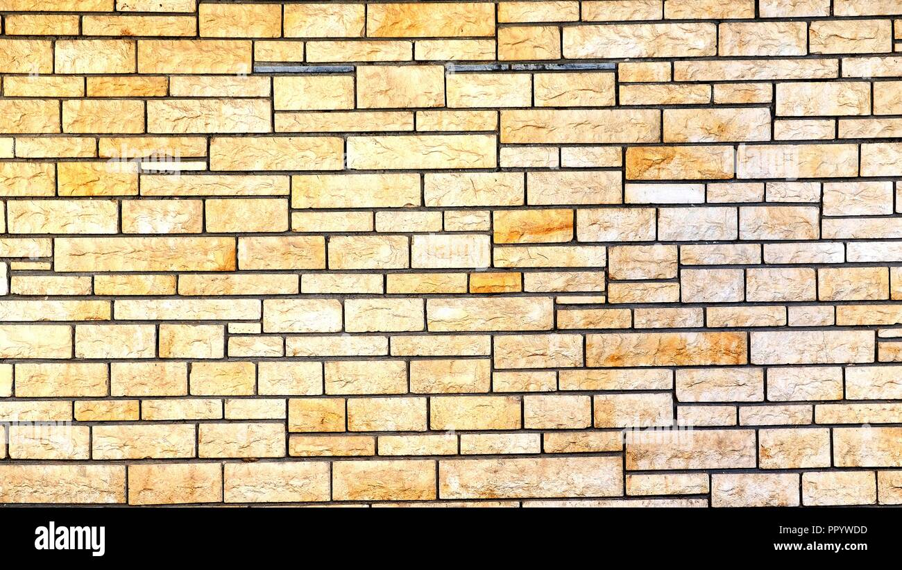 Stone Wall background from modern building contruction facade Stock ...