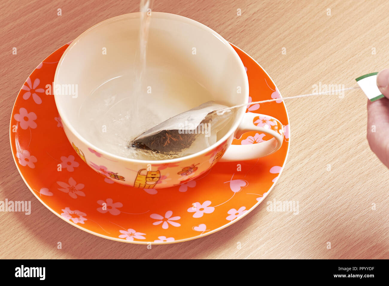 Close up pouring hot water hi-res stock photography and images - Alamy