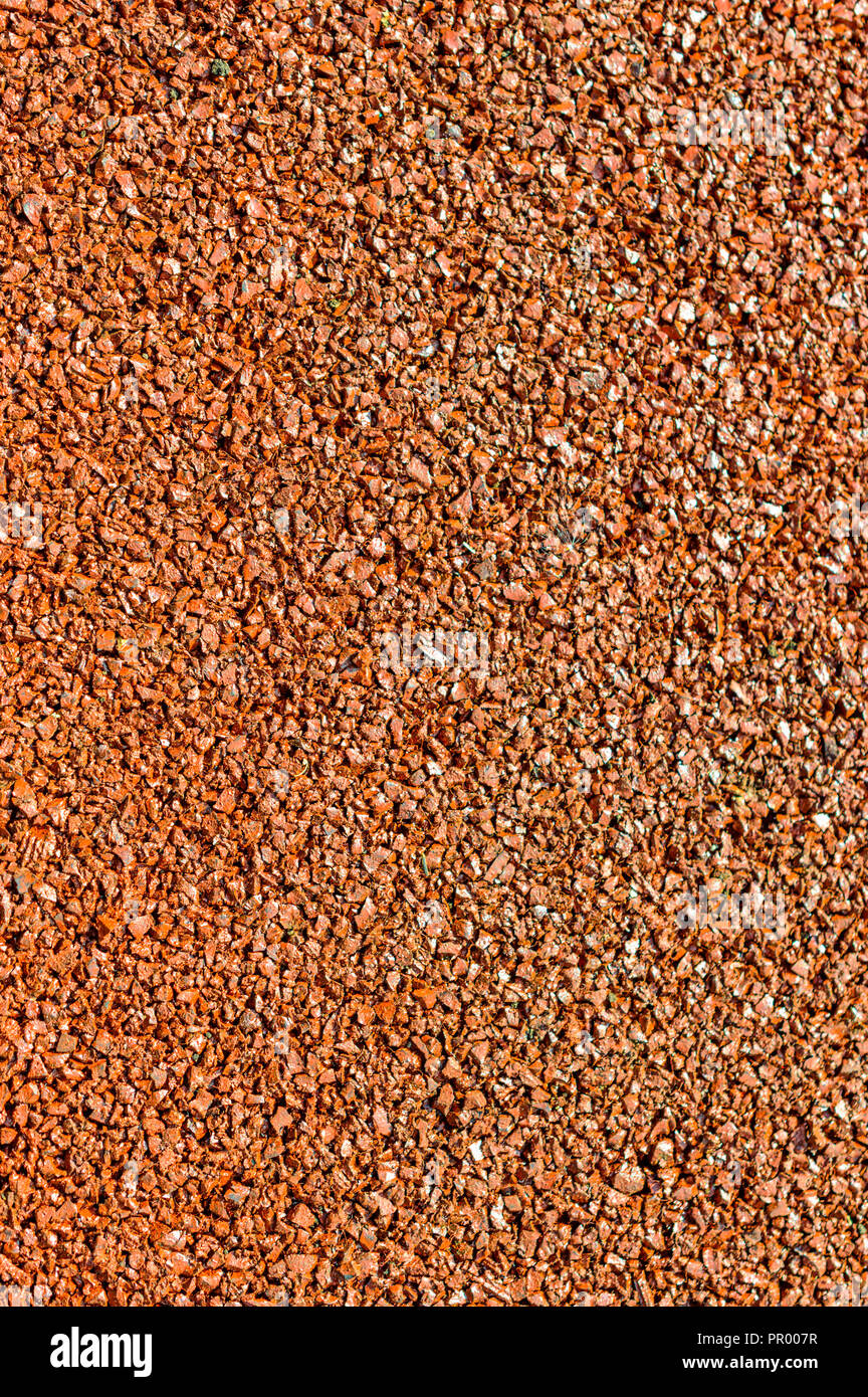 small stones of red color as the background Stock Photo - Alamy