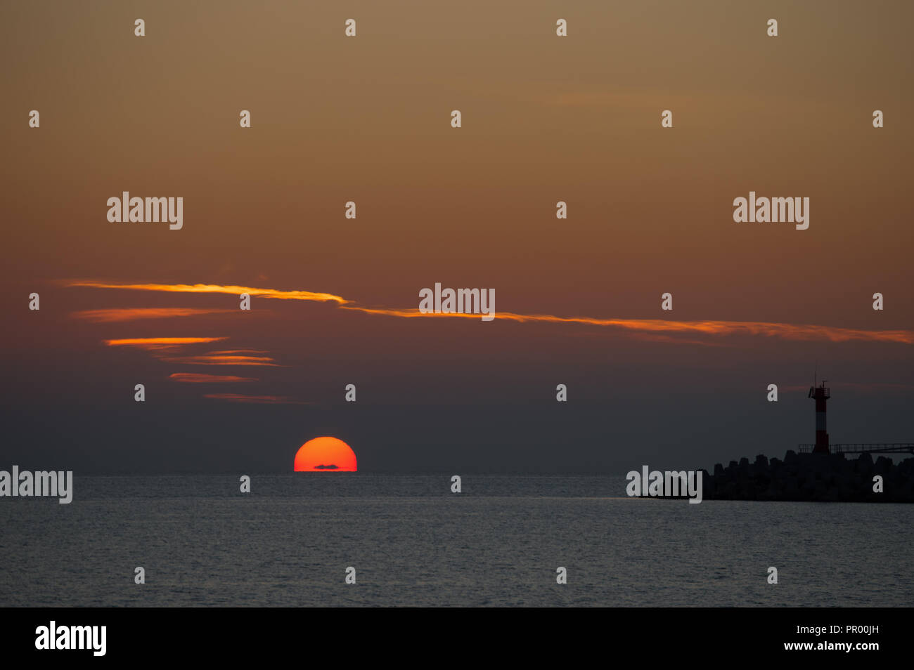 Sunset colors over sea hi-res stock photography and images - Alamy
