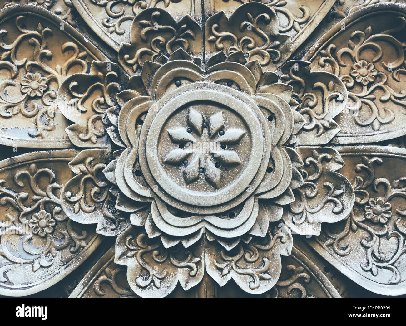 A floral pattern stone caving decoration on the wall in Chengdu Jinli ...