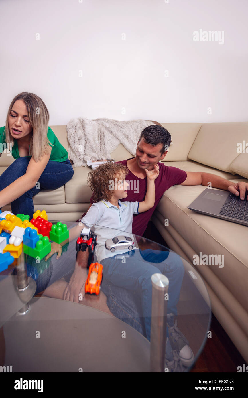 Dad looking after children hi-res stock photography and images - Alamy