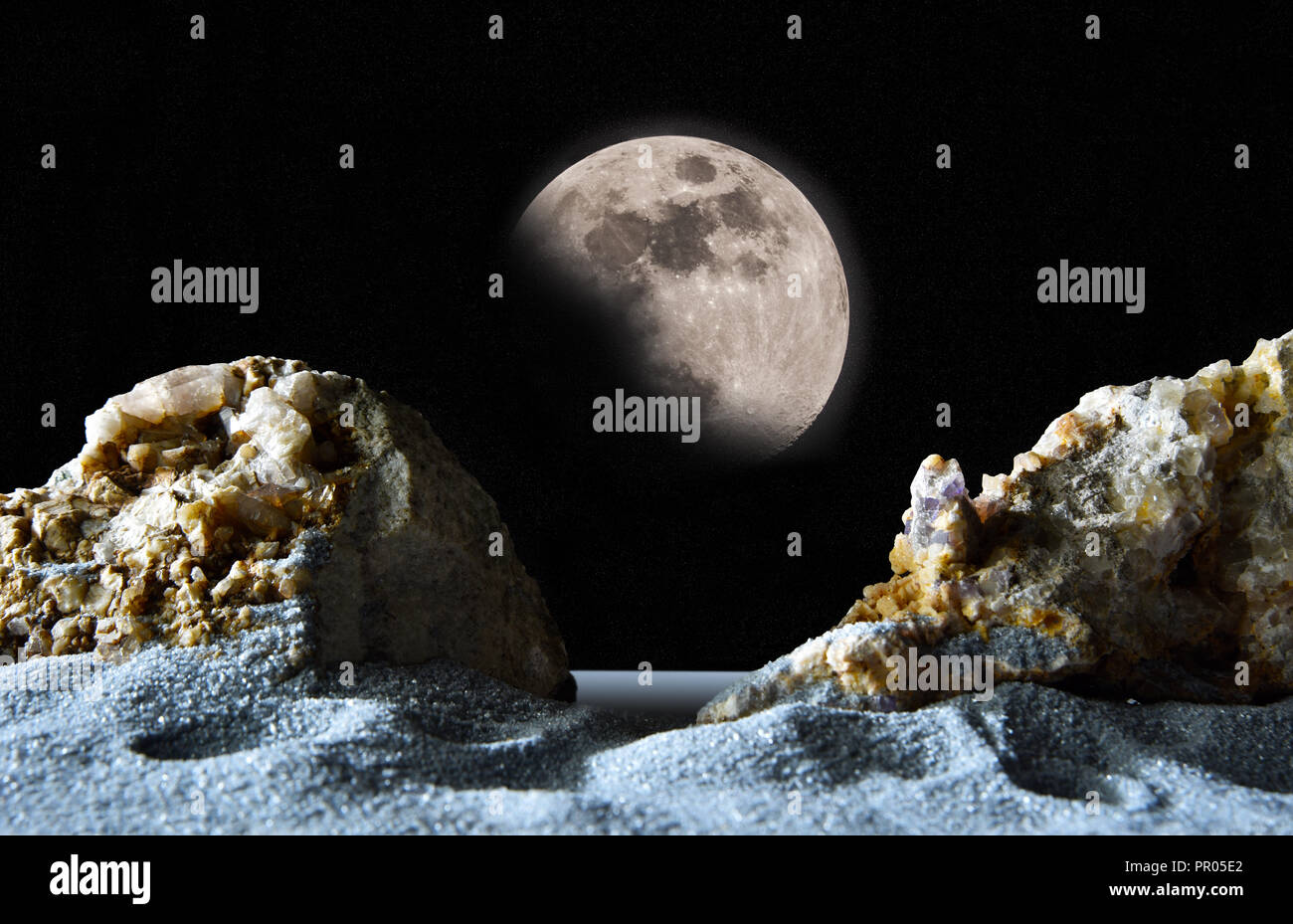 fantasy lunar landscape with rocks and moon in the sky Stock Photo - Alamy