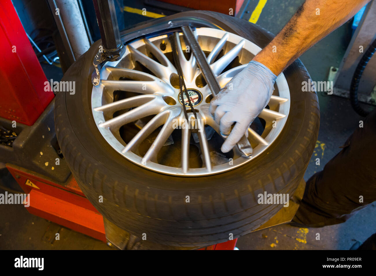 Car wheel rim lever hi-res stock photography and images - Alamy