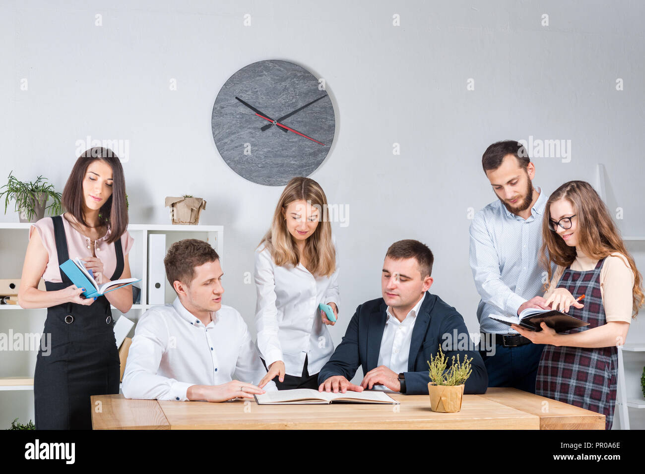 Young man sitting messy office hi-res stock photography and images - Alamy