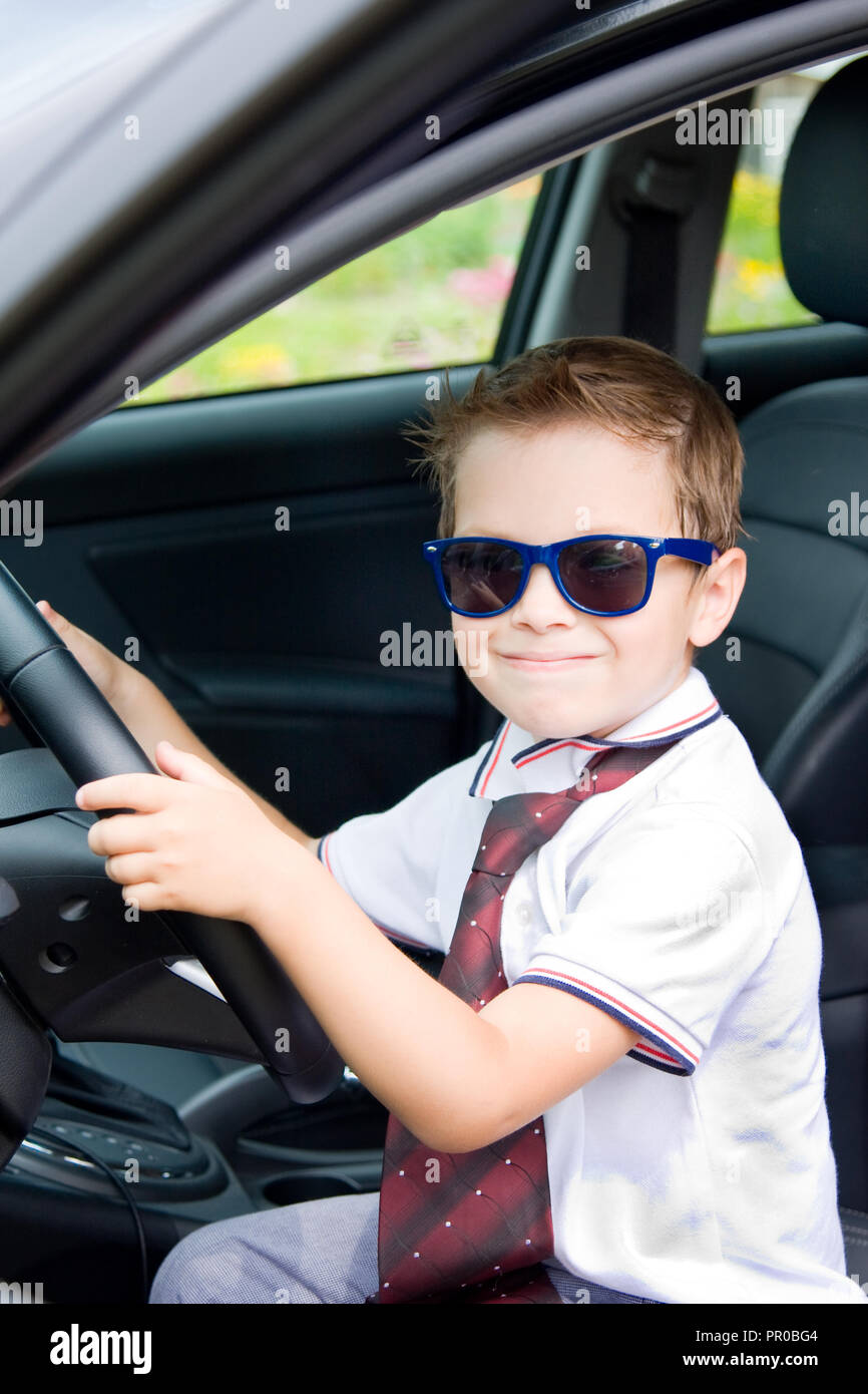 Cute driver in car Stock Photo - Alamy