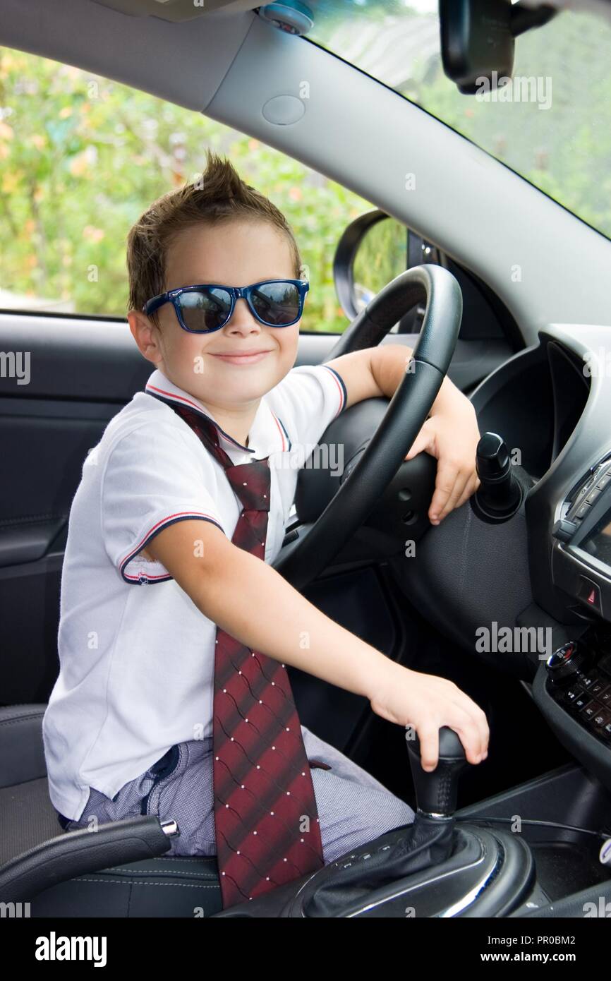 Cute driver in car Stock Photo - Alamy