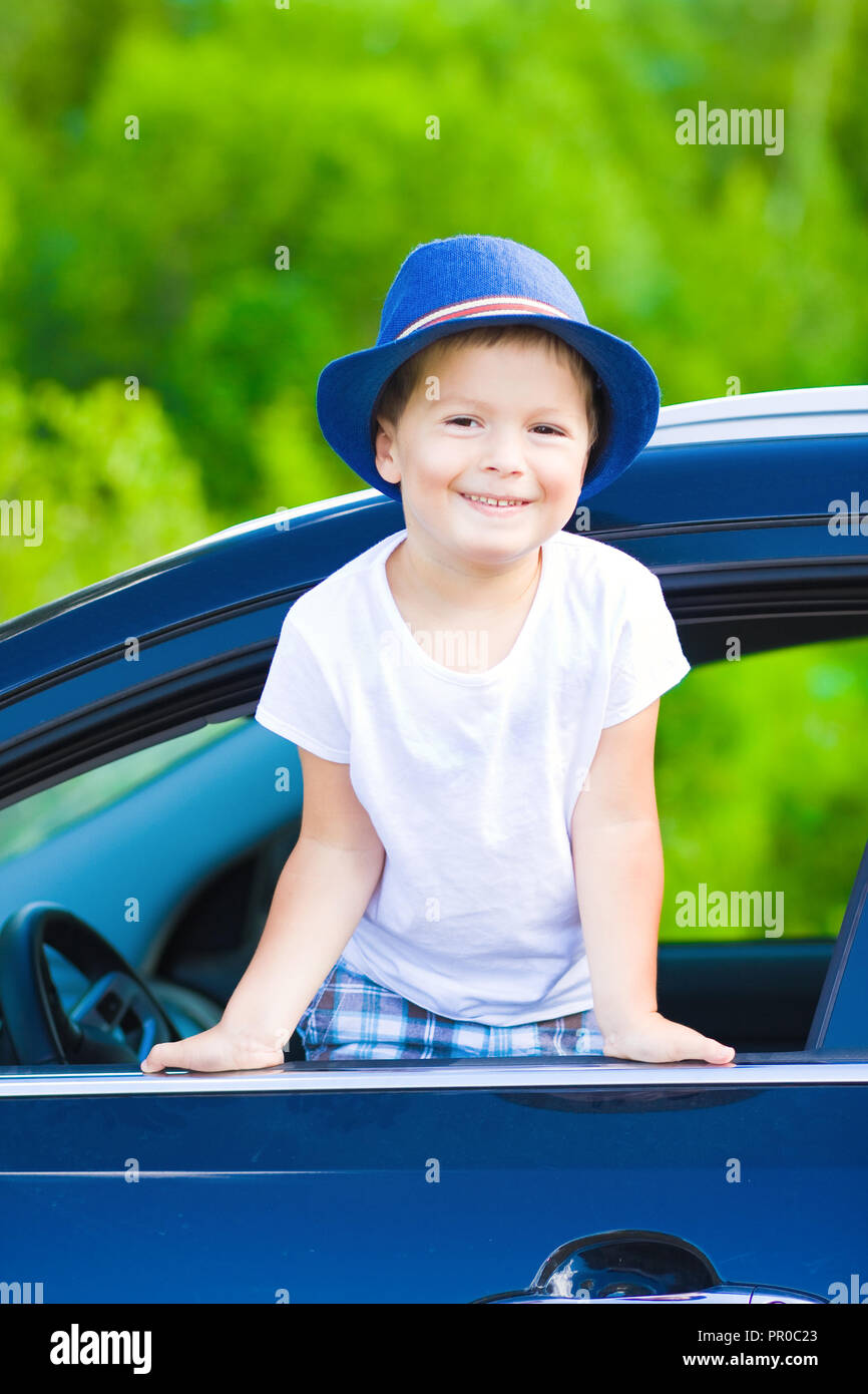 Cute driver in car Stock Photo - Alamy