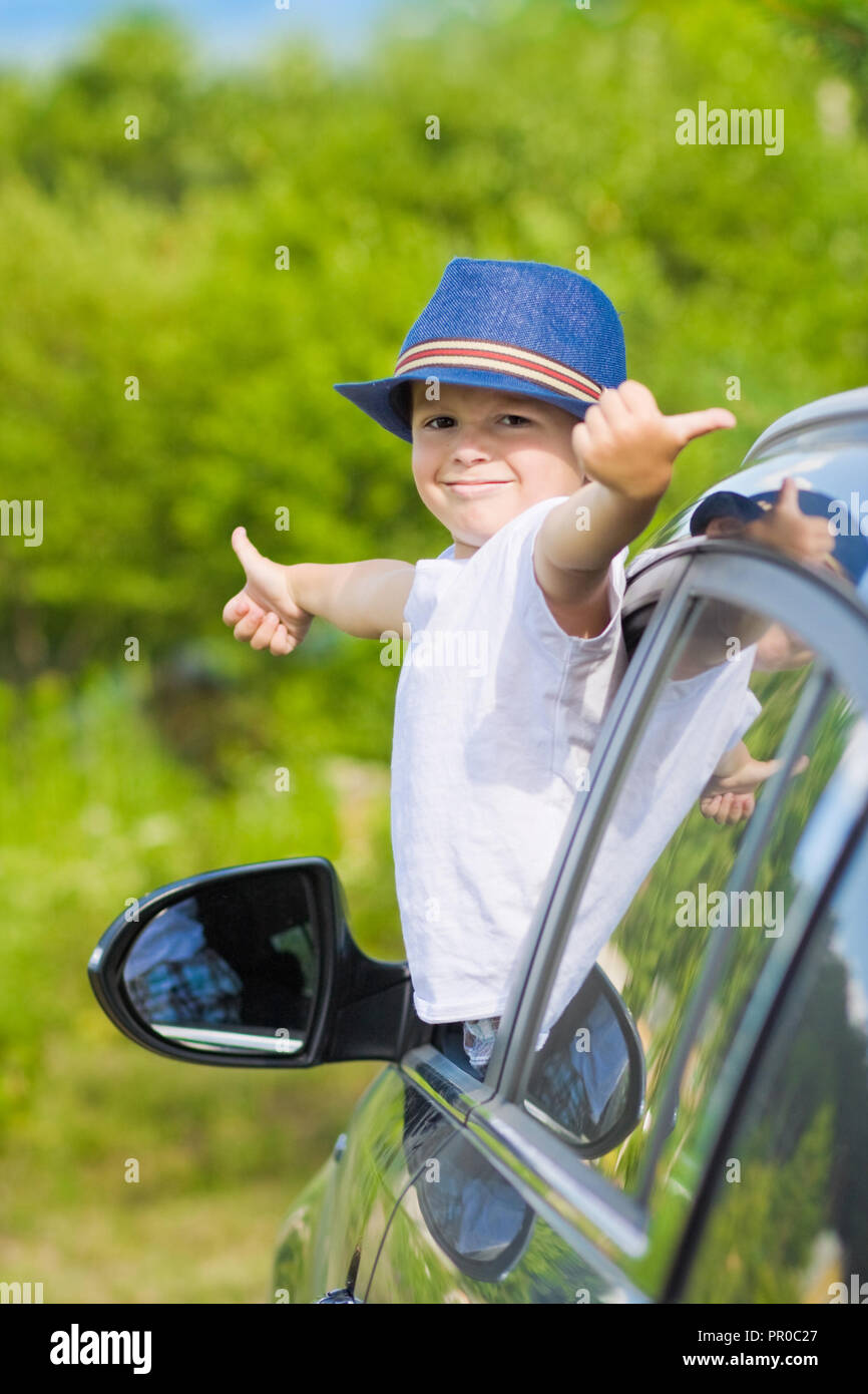 Cute driver in car Stock Photo - Alamy