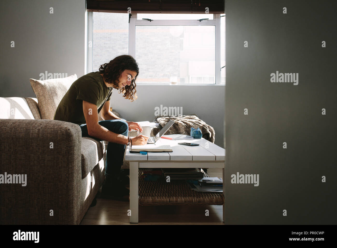 Male window and table hi-res stock photography and images - Alamy
