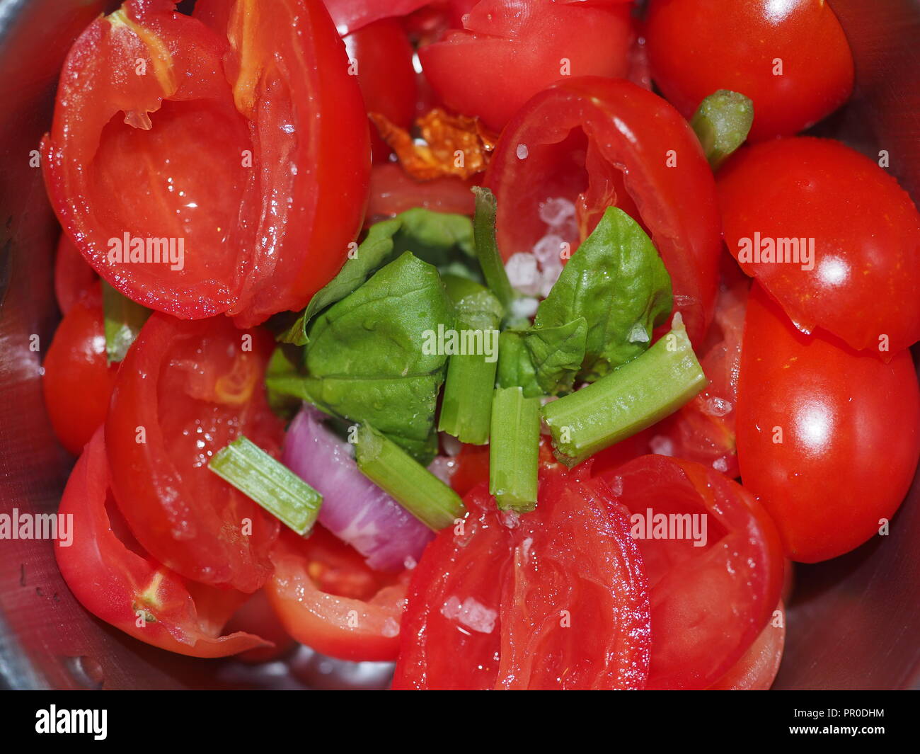 Preparation of tomato sauce ketchup used as pasta condiment, with ...