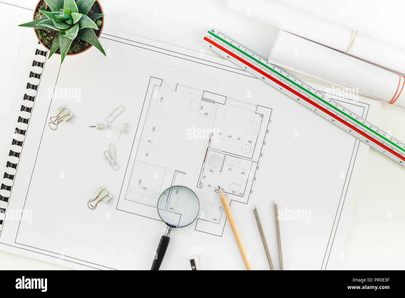 Creative flat lay overhead top view blueprints architectural flat ...