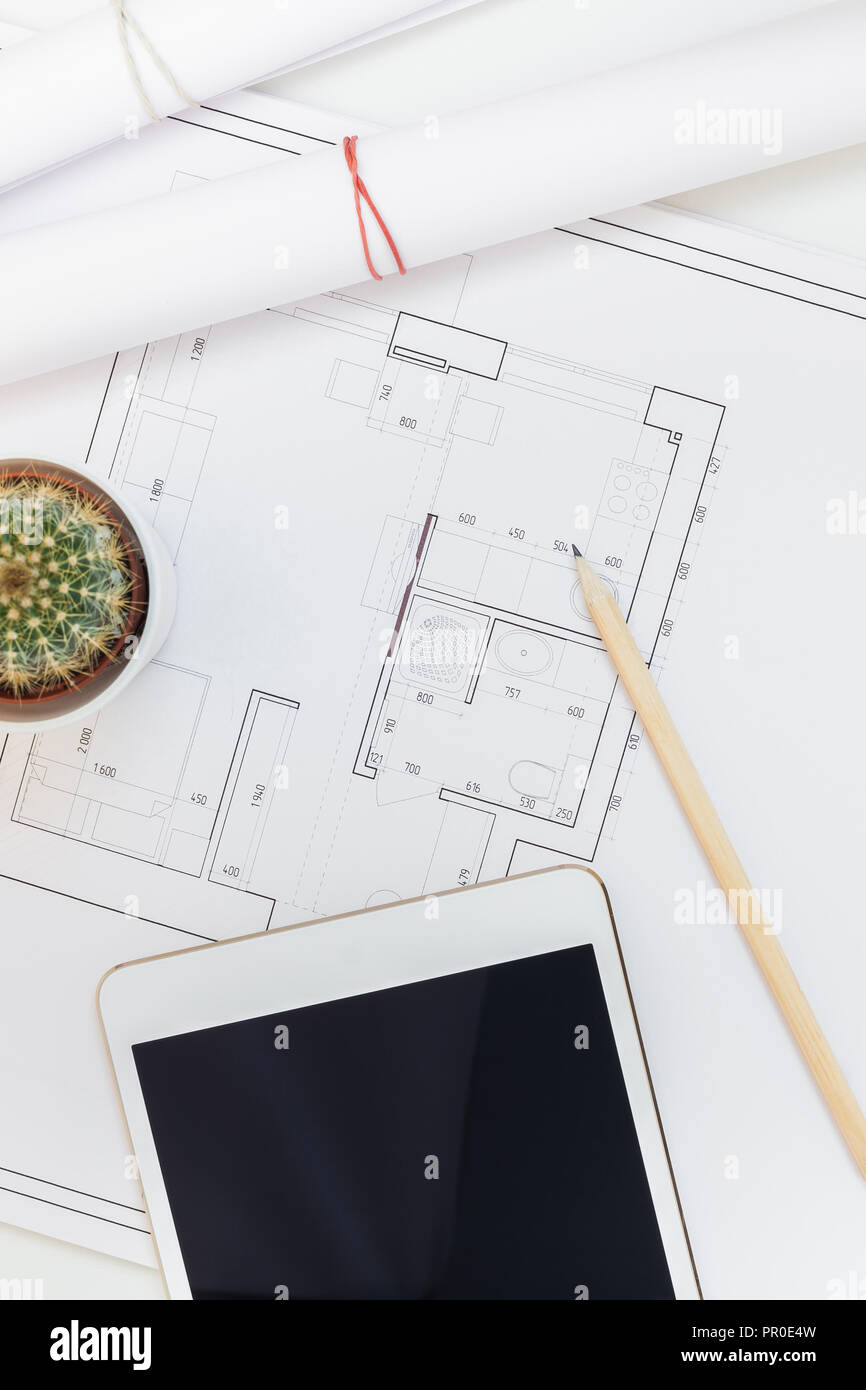 Creative flat lay overhead top view blueprints architectural flat ...