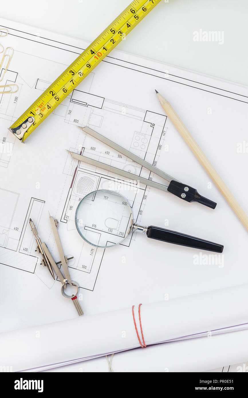 Creative flat lay overhead top view blueprints architectural flat ...