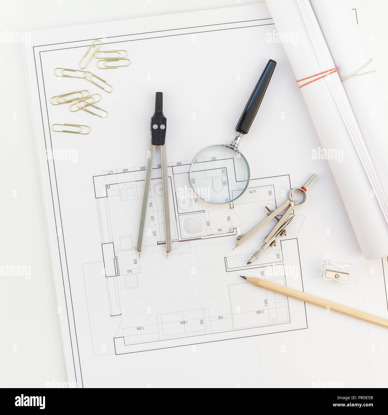 Creative flat lay overhead top view blueprints architectural flat ...