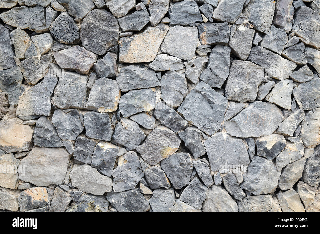 stone wall texture build from stone plates Stock Photo - Alamy