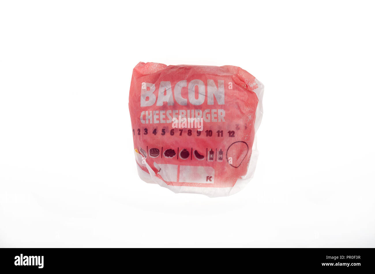 Burger King Bacon Cheeseburger in wrapper Stock Photo - Alamy