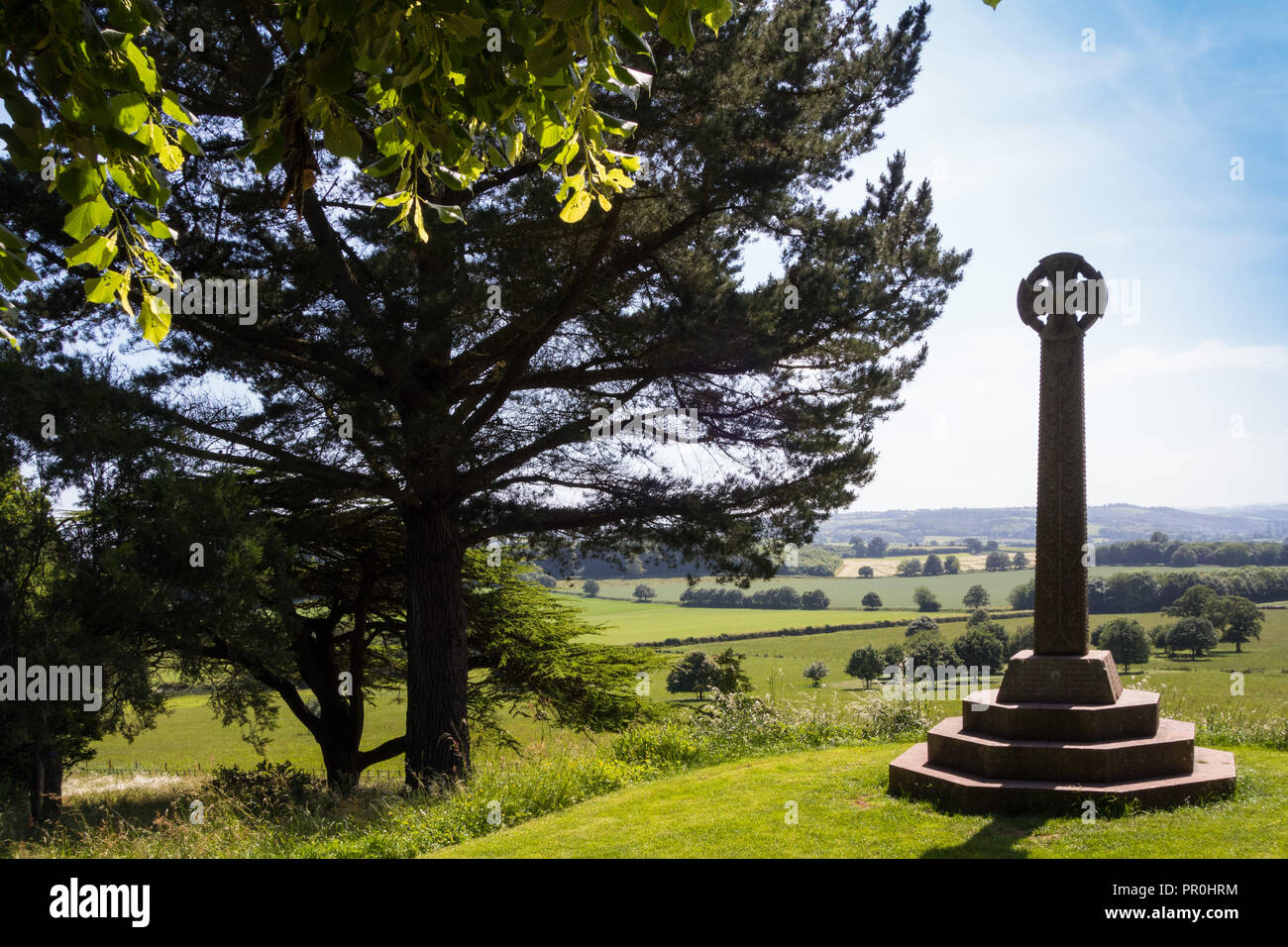 A Celtic cross landmark in a rural landscape in Devon, UK Stock Photo ...