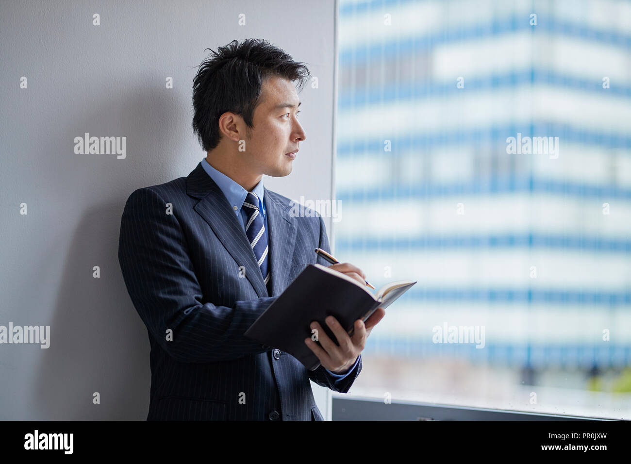 Japanese businessman in the office Stock Photo - Alamy