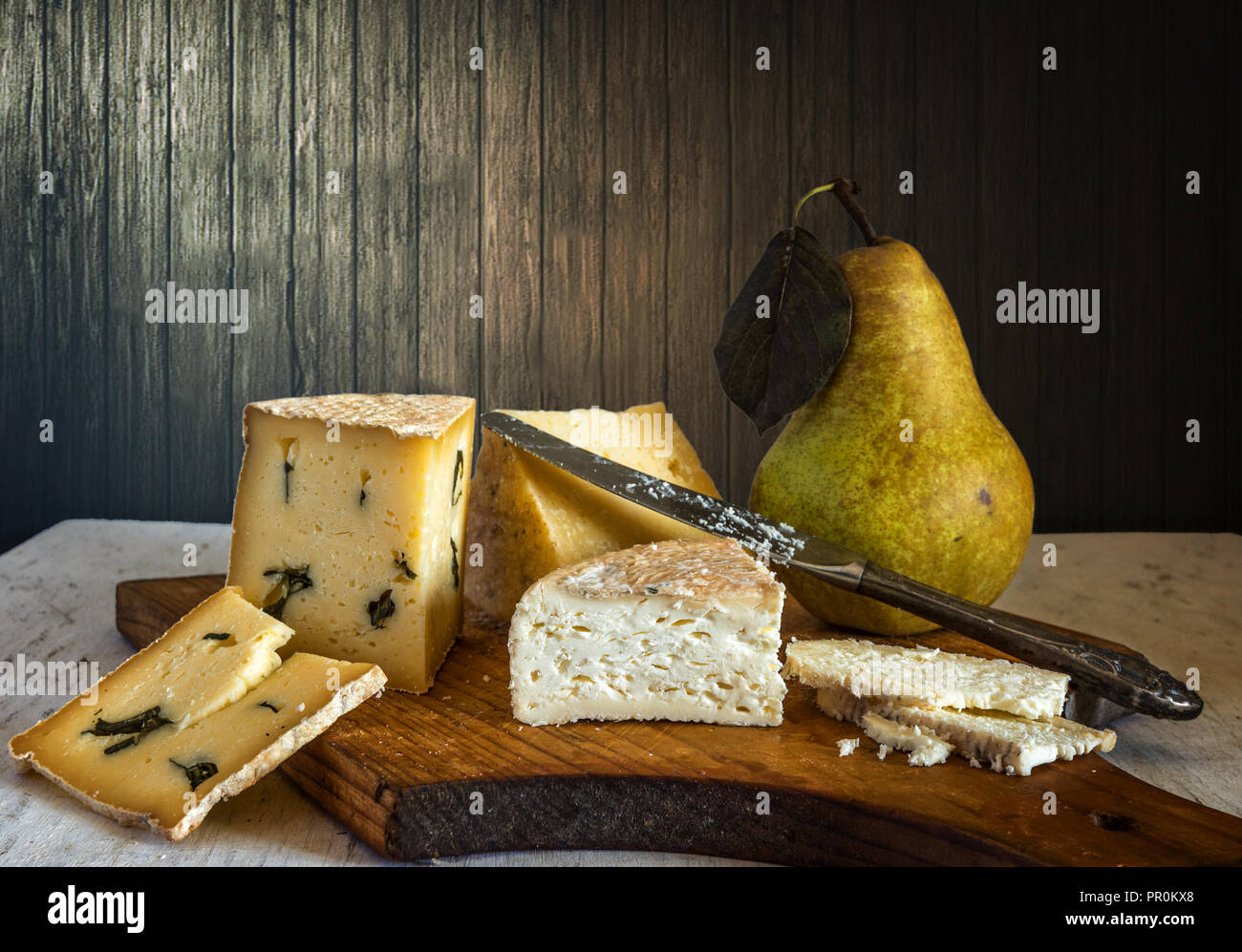 still life with cheese and pear. food. delicious. vintage. retro Stock ...