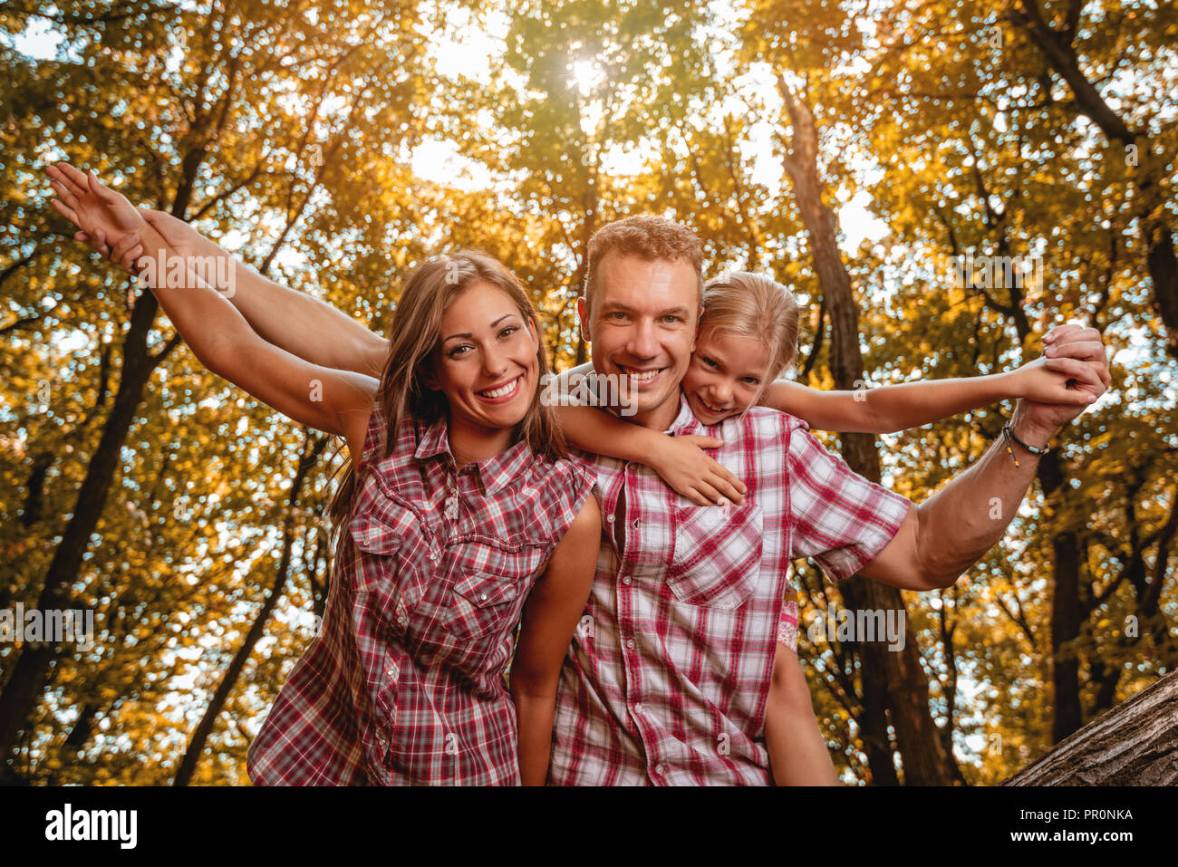 Beautiful young family hi-res stock photography and images - Alamy
