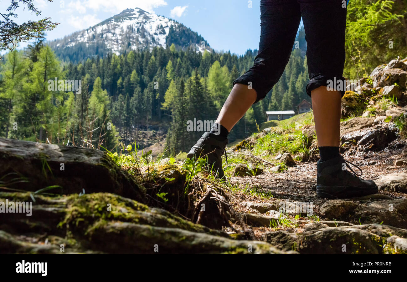 feet in shoes on a forest path Stock Photo - Alamy